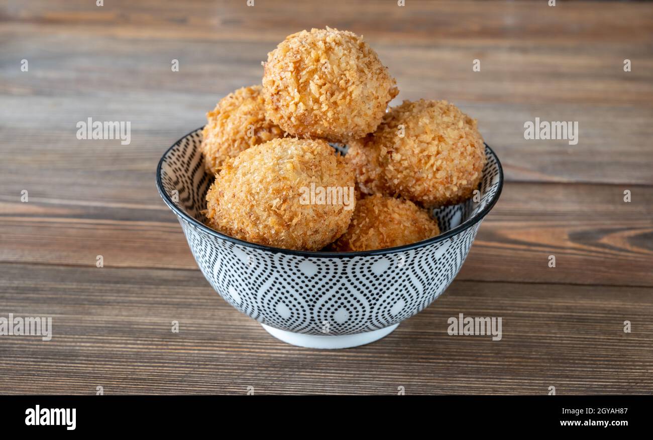 Bowl of breaded and deep fried Croquettes Stock Photo - Alamy