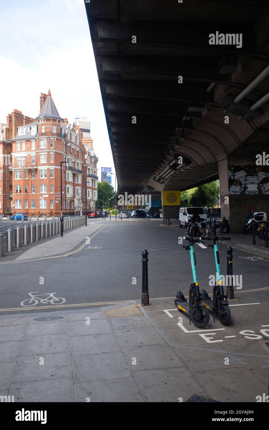 Tier electric hire scooters underneath the flyover at Hammersmith in ...