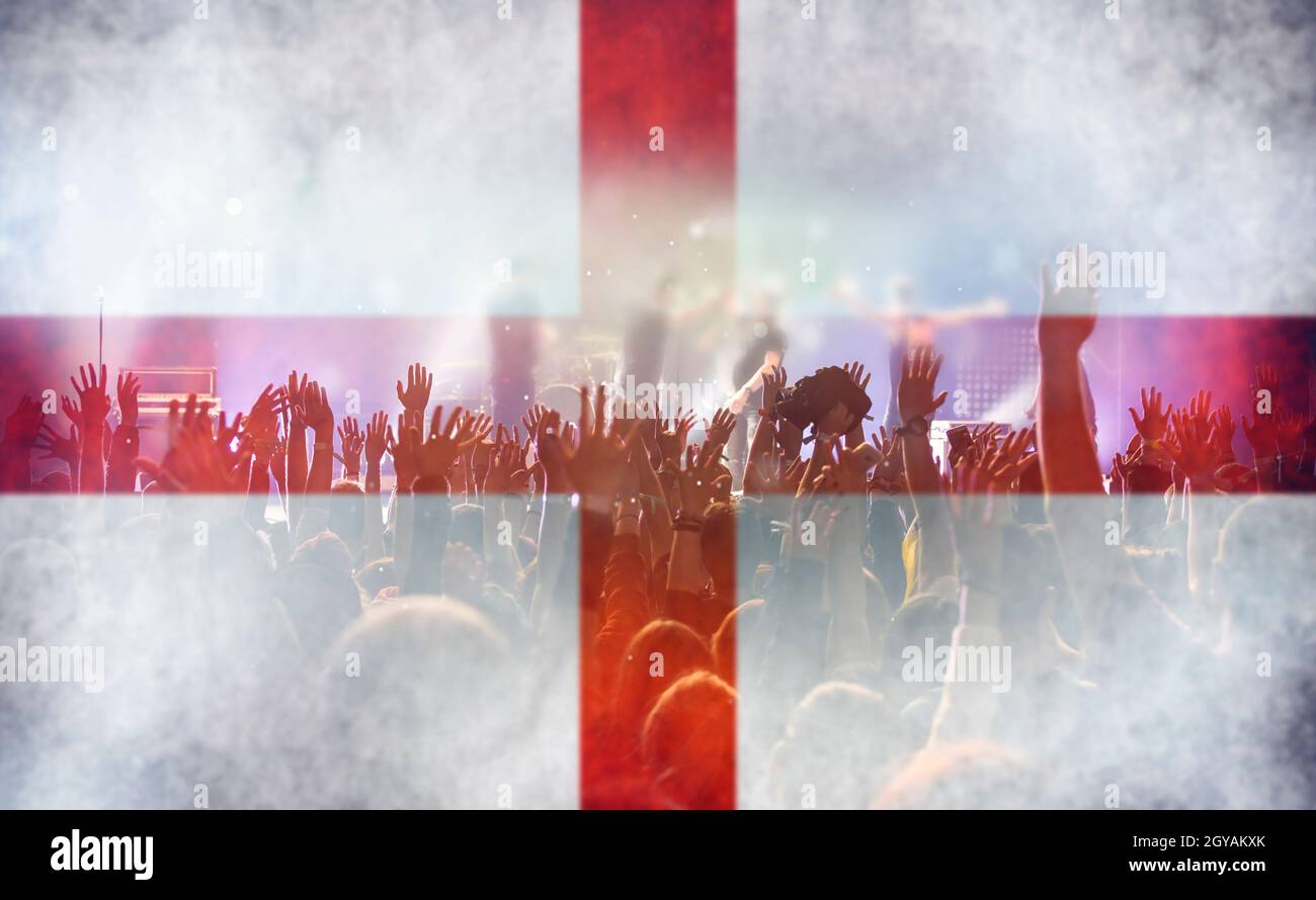 Football fans supporting England - crowd celebrating in stadium with ...