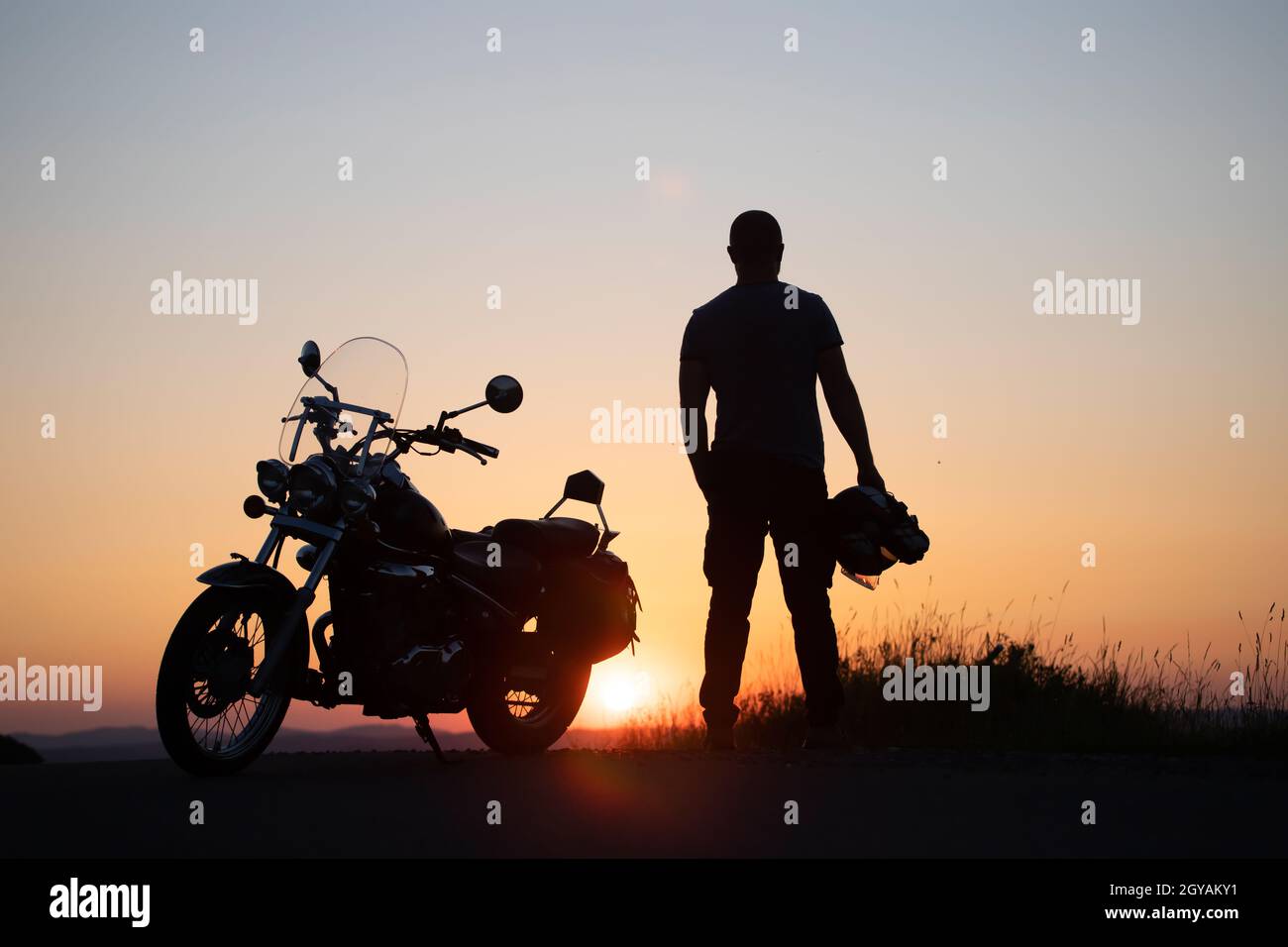 Motorcycle driver riding alone on asphalt motorway. Travel and sport ...