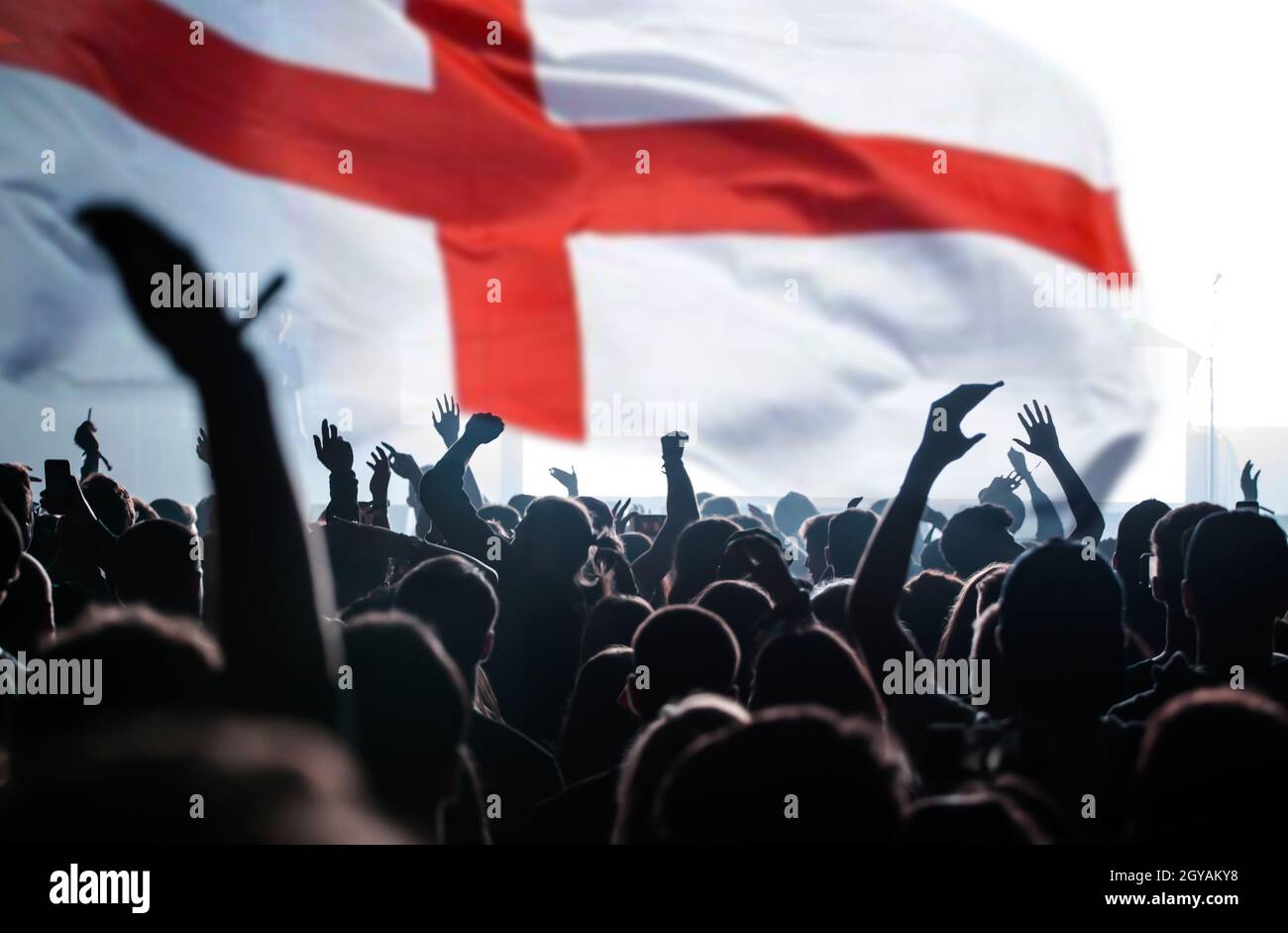 Football fans supporting England - crowd celebrating in stadium with ...