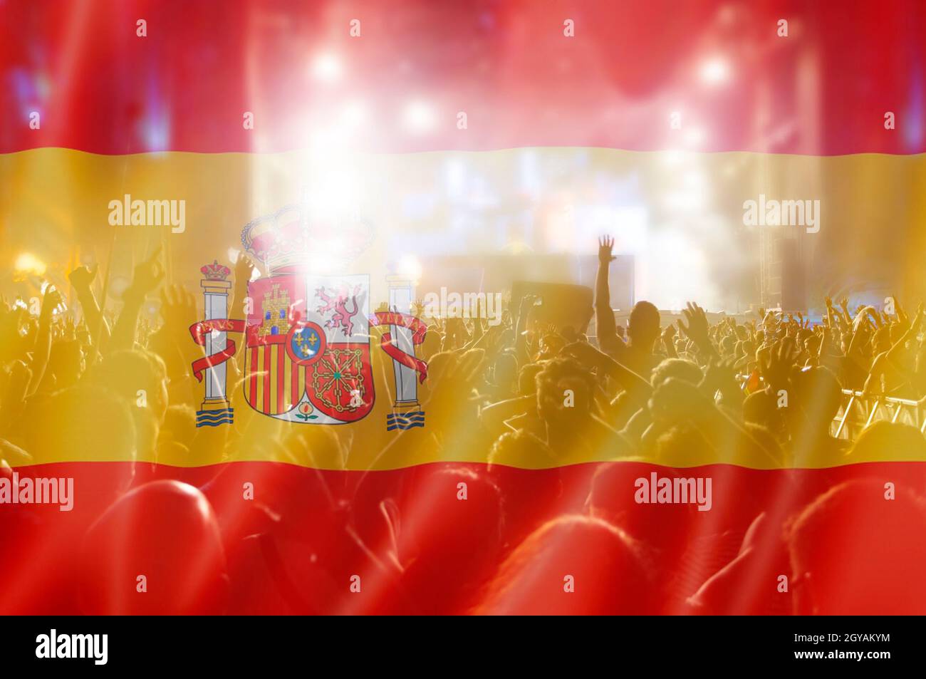 Soccer fans supporting Spain - crowd celebrating in stadium with raised ...