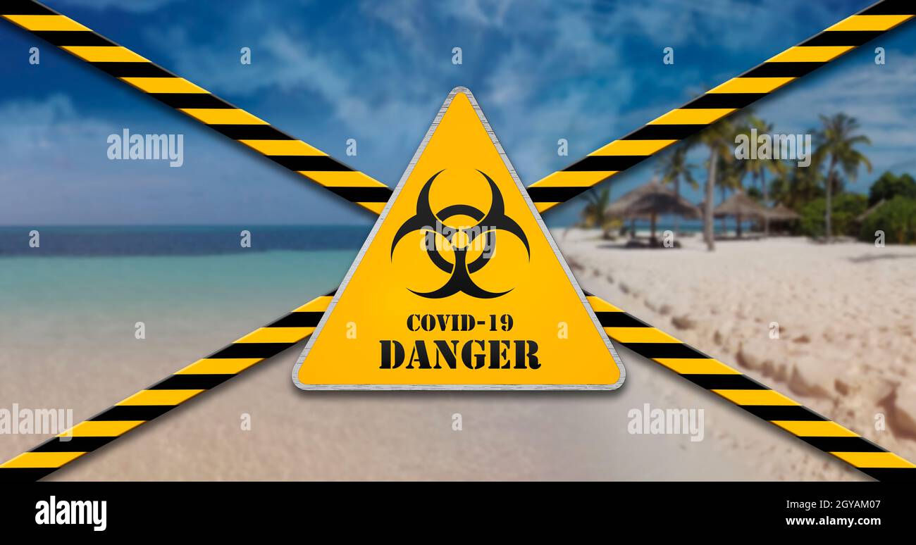 Beach closed due to Coronavirus, Covid19. Caution tape and danger sign ...