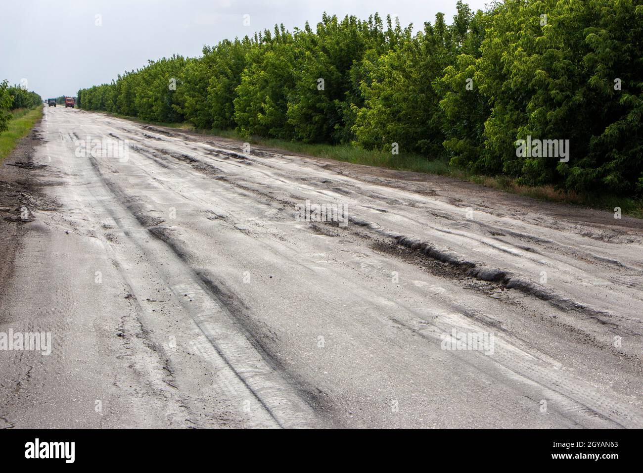 Broken road surface hi-res stock photography and images - Alamy