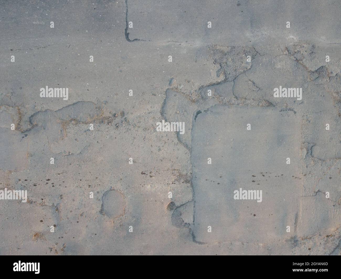 Damaged road surface. Broken asphalt Stock Photo - Alamy