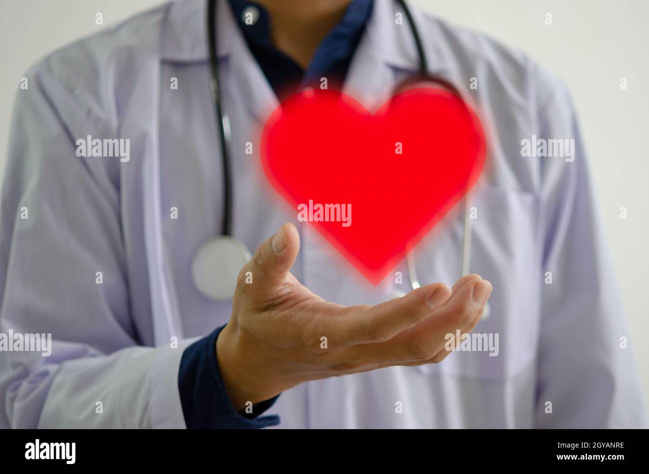 doctor's hand with the red heart icon. Sending encouragement to doctors ...