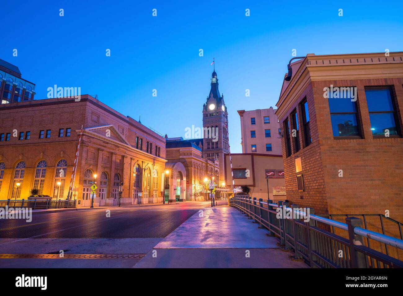 Downtown skyline with Buildings along the Milwaukee River at night, in ...