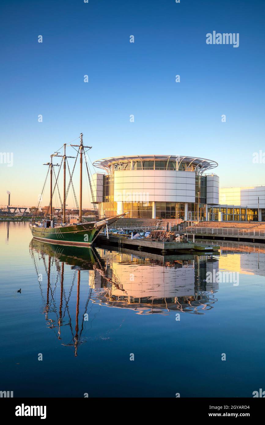Milwaukee skyline at twilight with city reflection in lake Michigan and ...