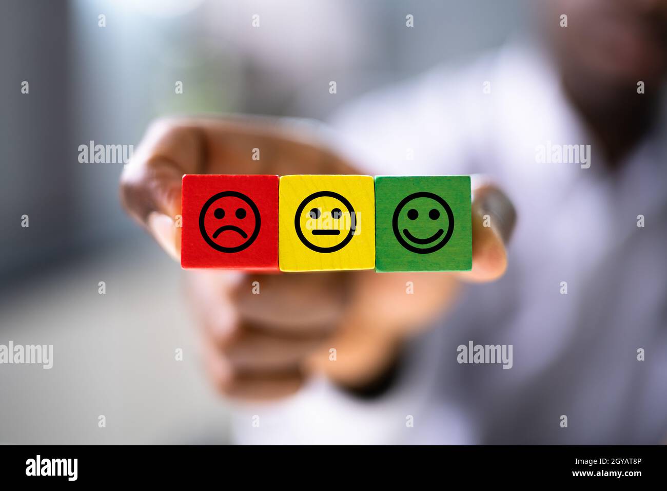 African American Hand With Survey Feedback Blocks Stock Photo - Alamy