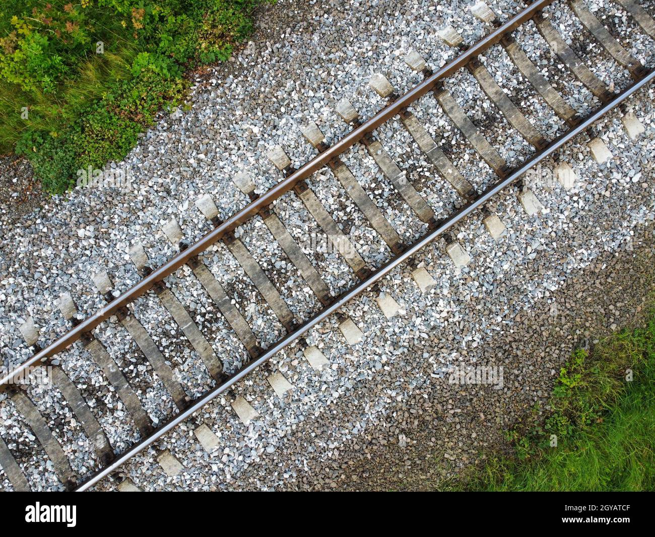 Background with gravel and railroad line Stock Photo - Alamy