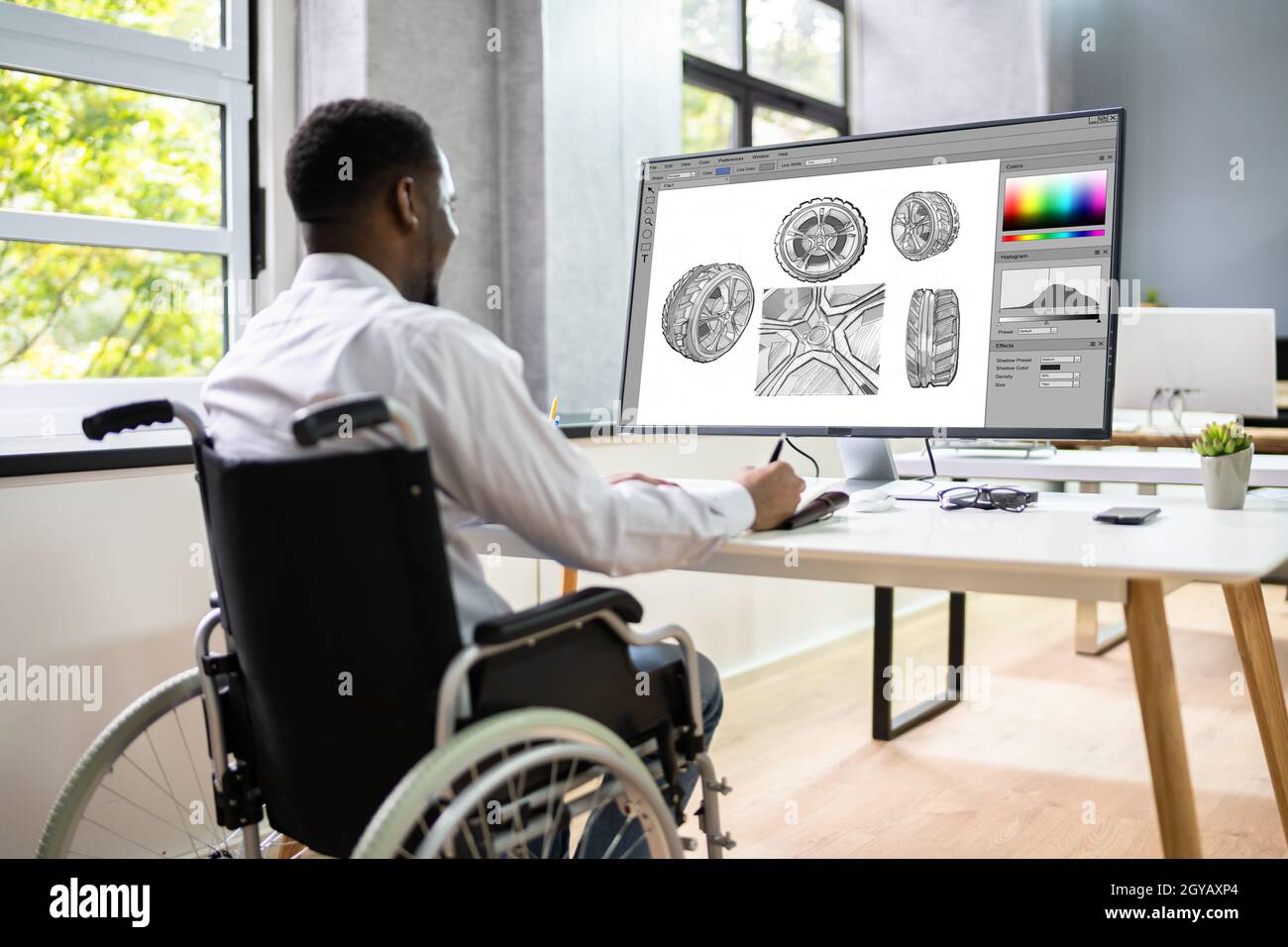 African Graphic Web Designer Using Design Editing Software Stock Photo ...