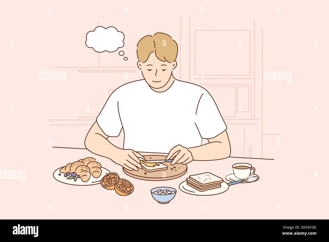 Young man spreading butter on hi-res stock photography and images - Alamy