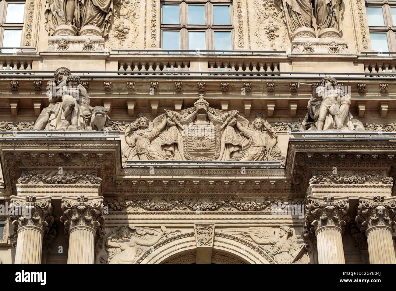 Paris - Architectural fragments of Louvre building. Louvre Museum is ...