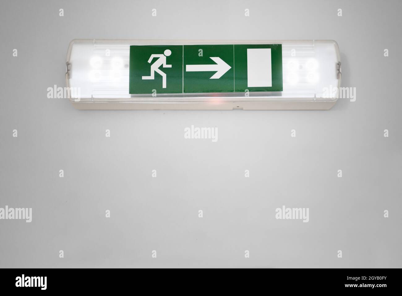 Emergency Evacuation Exit Sign. Fire Escape Guide Stock Photo - Alamy