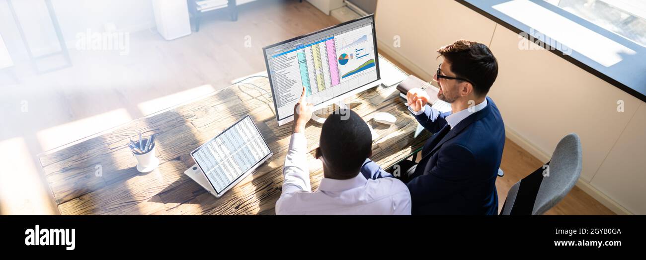 Young man working on spreadsheet hi-res stock photography and images ...