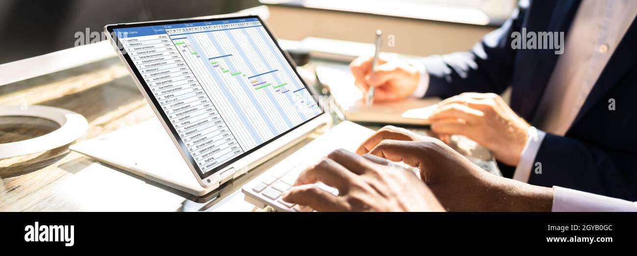 Digital Gantt Chart On Laptop In Office Stock Photo - Alamy