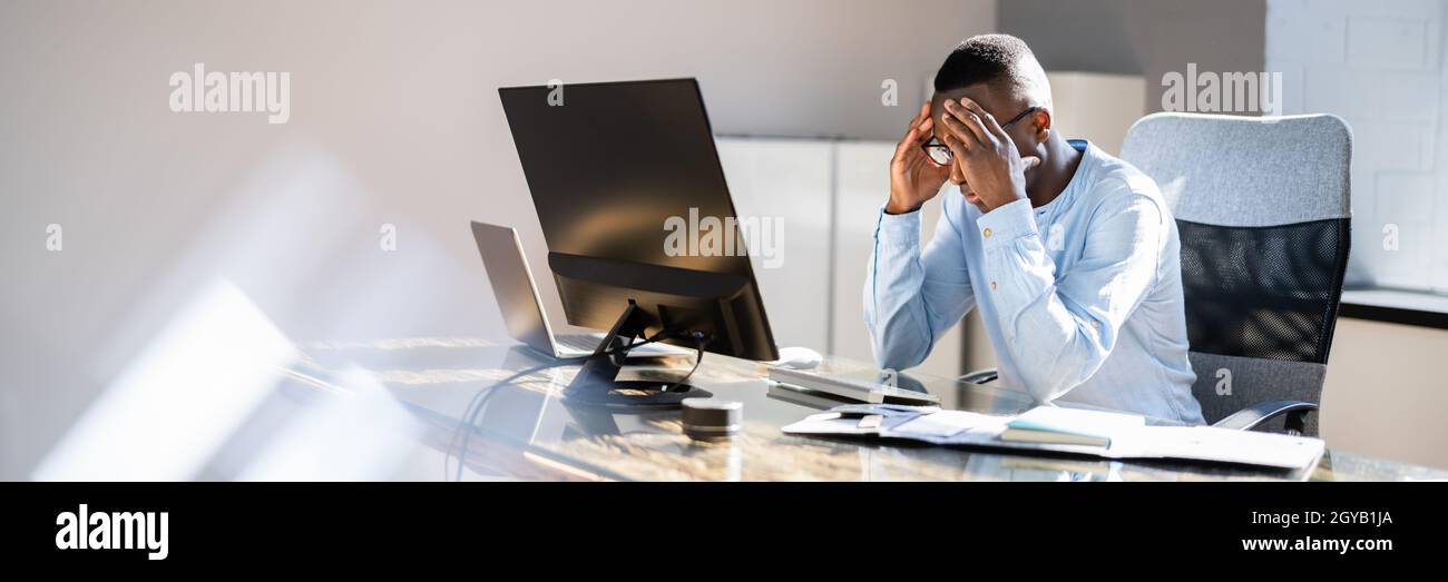 Young stressed african man using hi-res stock photography and images ...