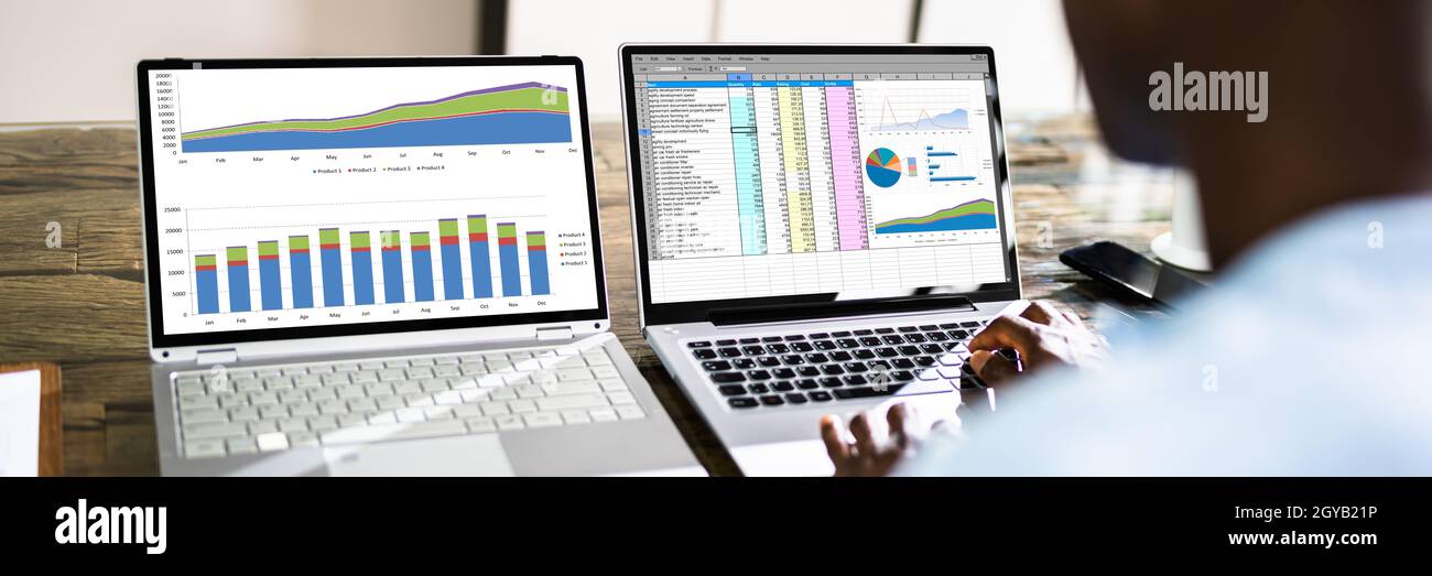Spreadsheet Data Analyst Employee Using Multiple Computer Screens Stock ...