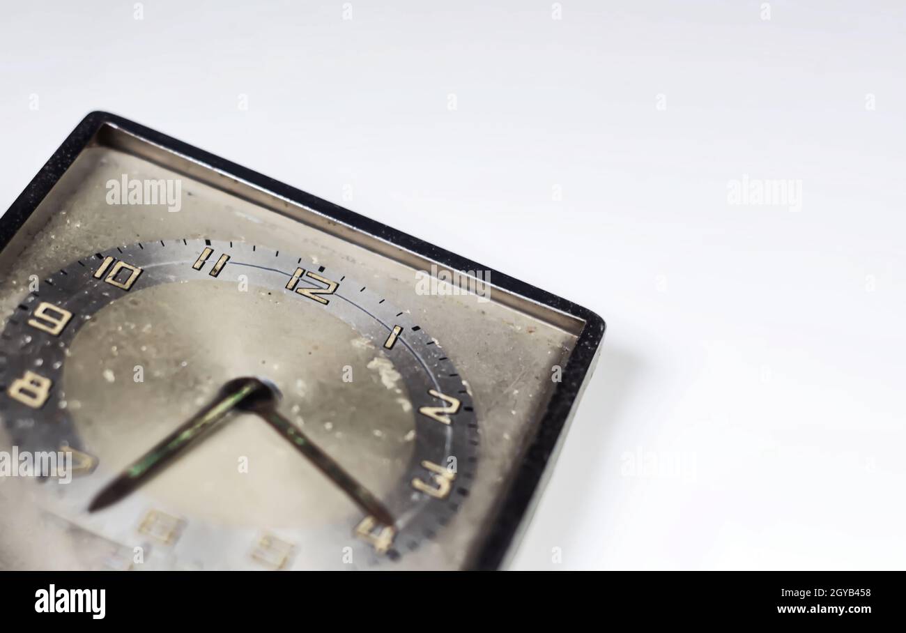 Old worn clock with square dial isolated on a white background. Analog ...
