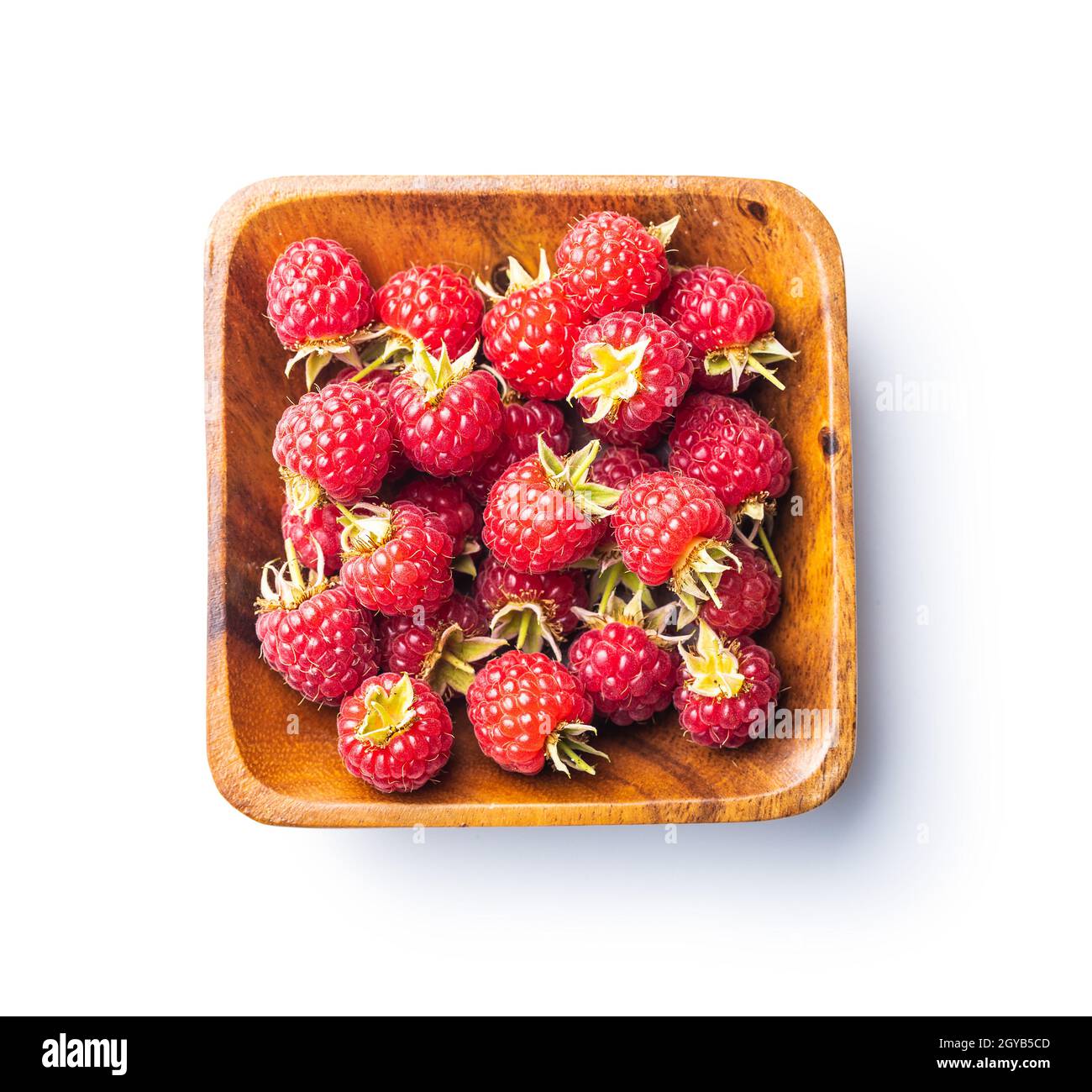 Fresh red raspberries in bowl isolated on white background Stock Photo ...