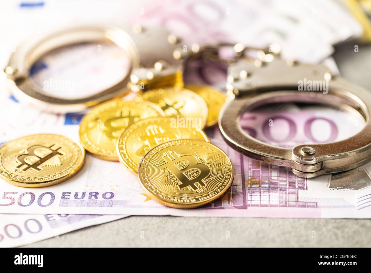 Golden handcuffs hi-res stock photography and images - Alamy