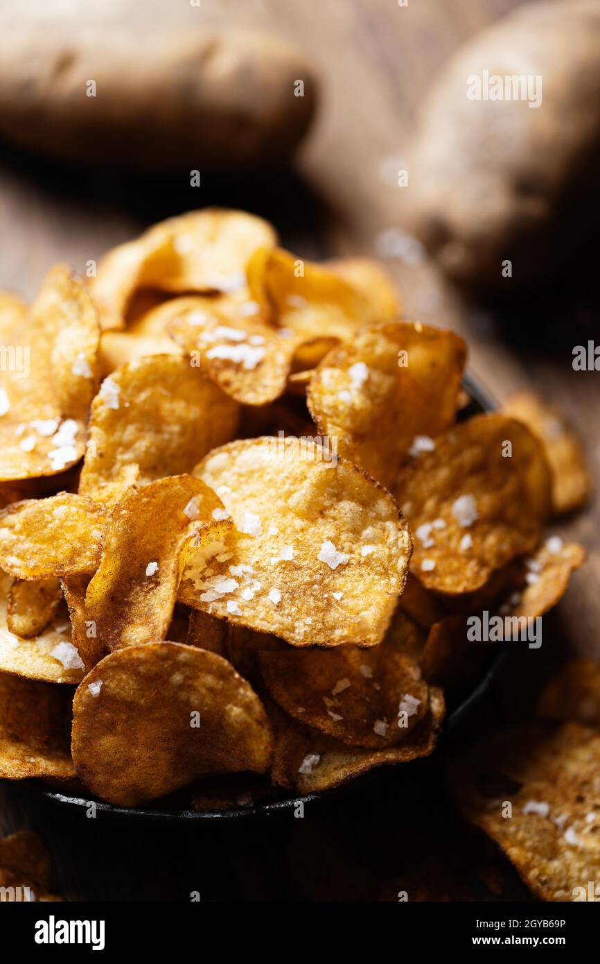 close up of a heap of golden potato crisps Stock Photo - Alamy