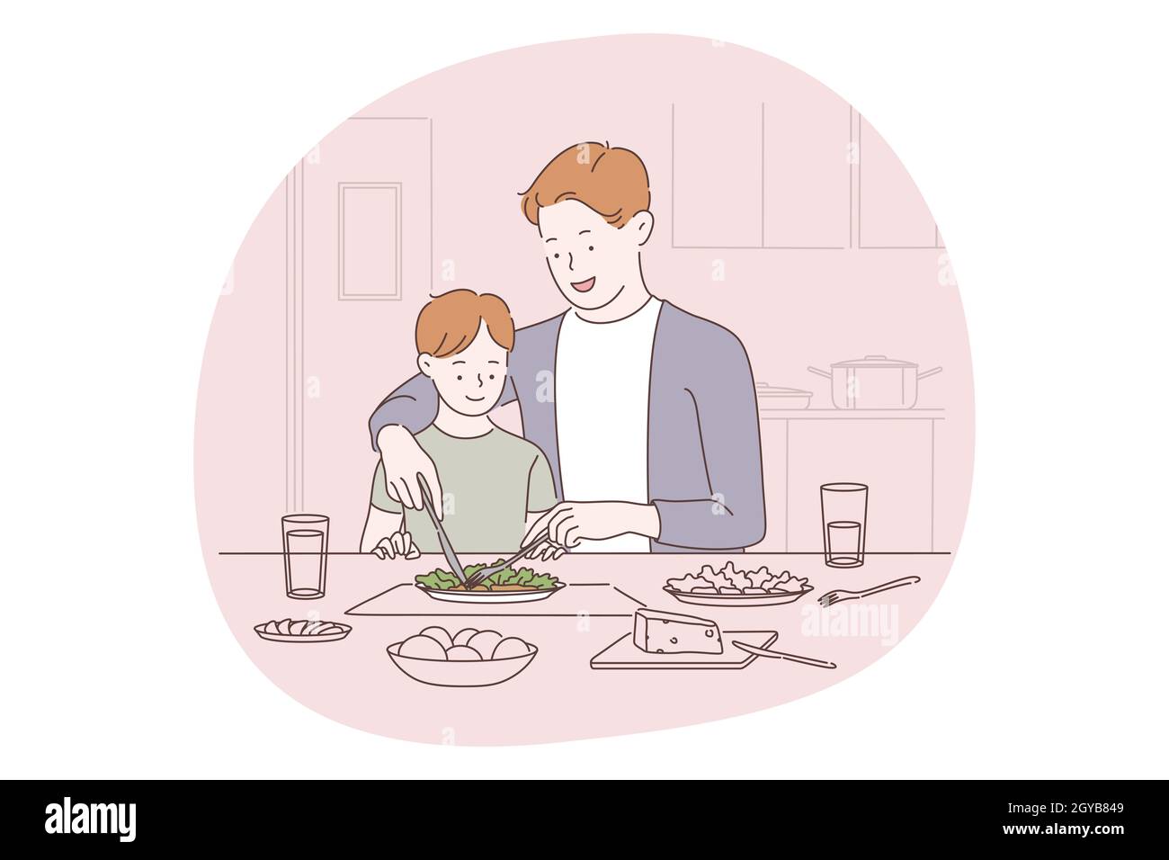 Father son eating in kitchen Cut Out Stock Images & Pictures - Alamy