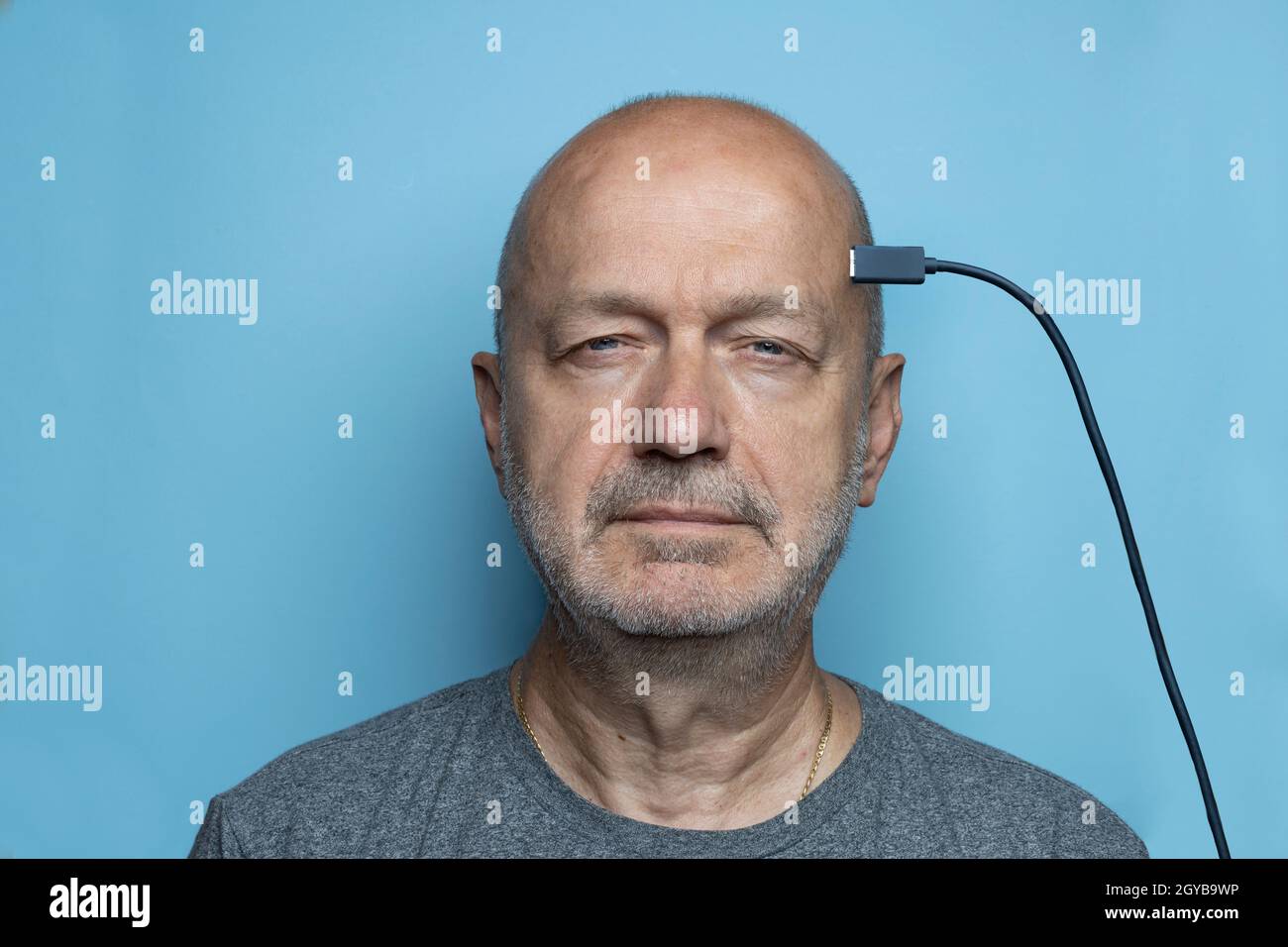 A man with the brain connected by an USB cable Stock Photo - Alamy