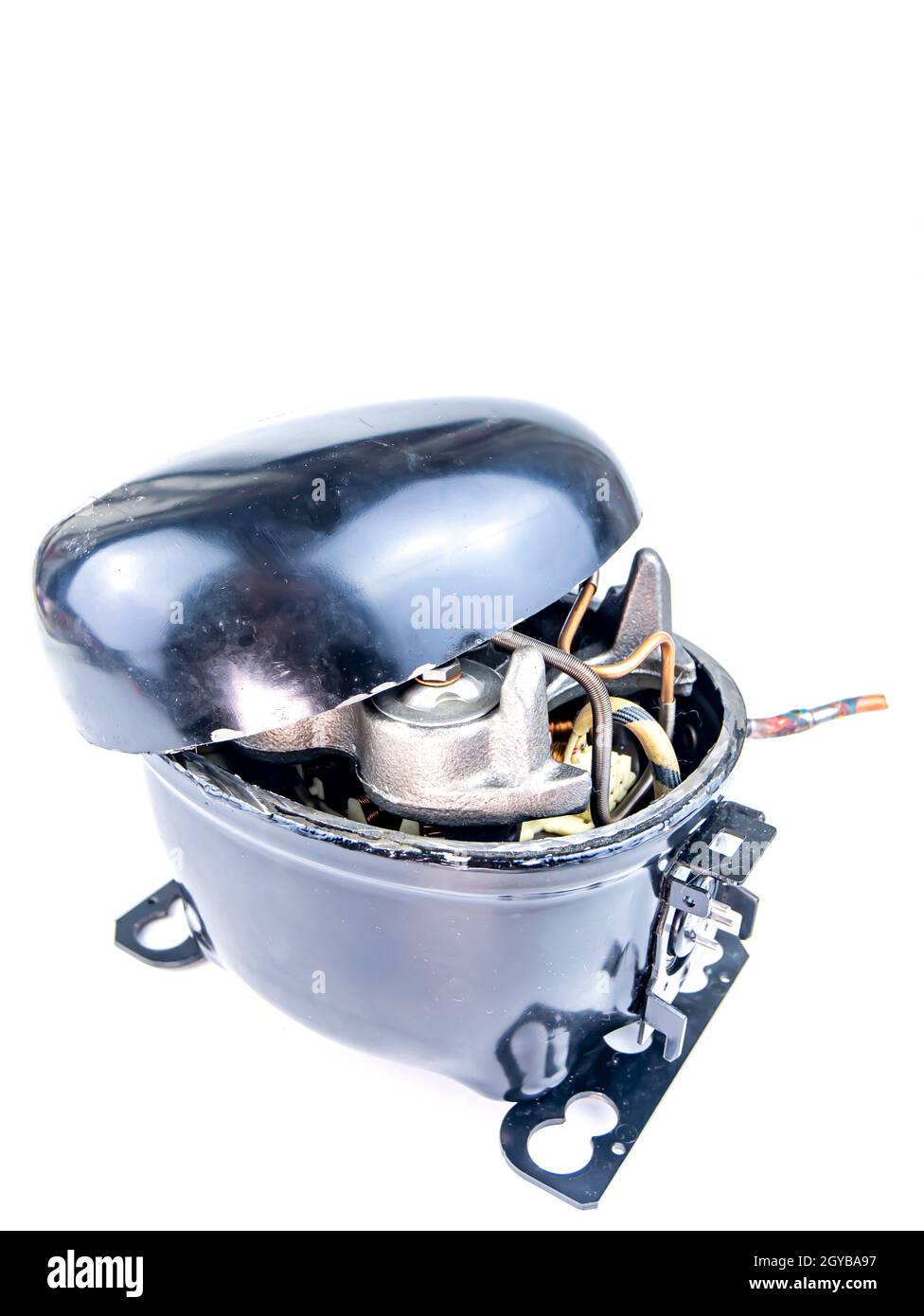 Compressor for repairing refrigerators on a white background. Repair of ...