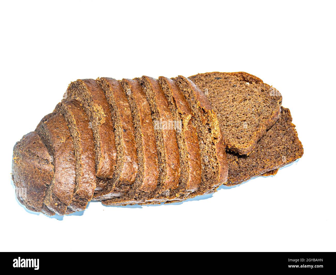 Sliced brown bread on a white background. Food photo. Place for text ...