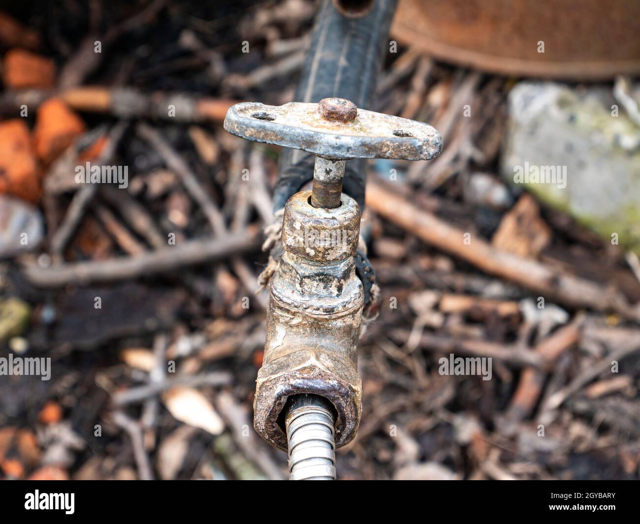 Old plumbing water tap with a metal valve. Equipment. Plumbing work ...