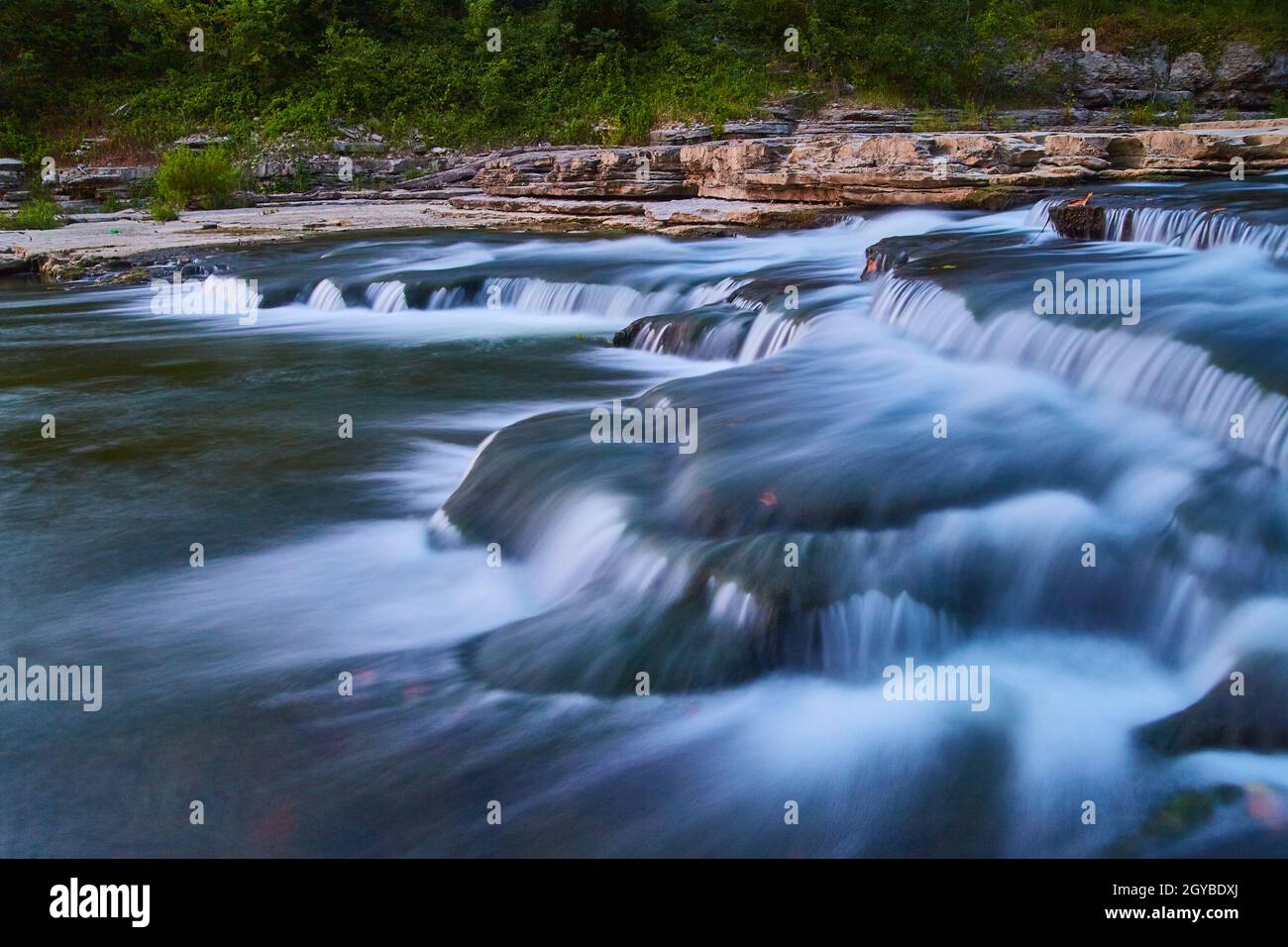 Flowing river mountain natural scenery hi-res stock photography and ...