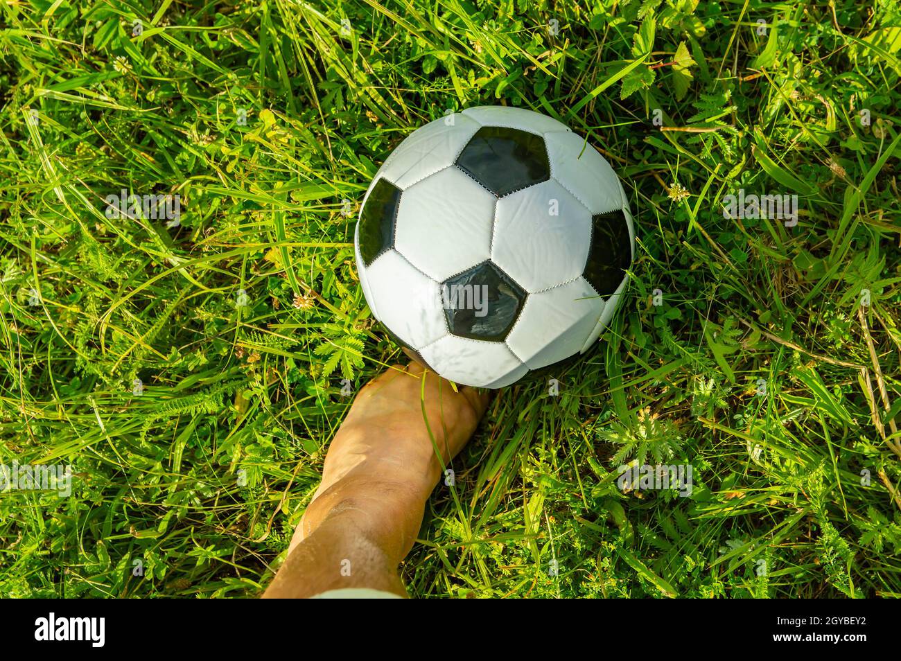 Male barefoot on green grass hi-res stock photography and images - Alamy