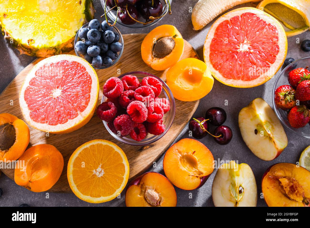 Composition with a variety of fresh culinary fruits Stock Photo - Alamy