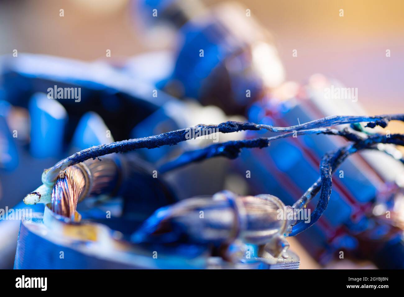 Burnt wires on the parts of an electrical appliance, drills on a wooden ...