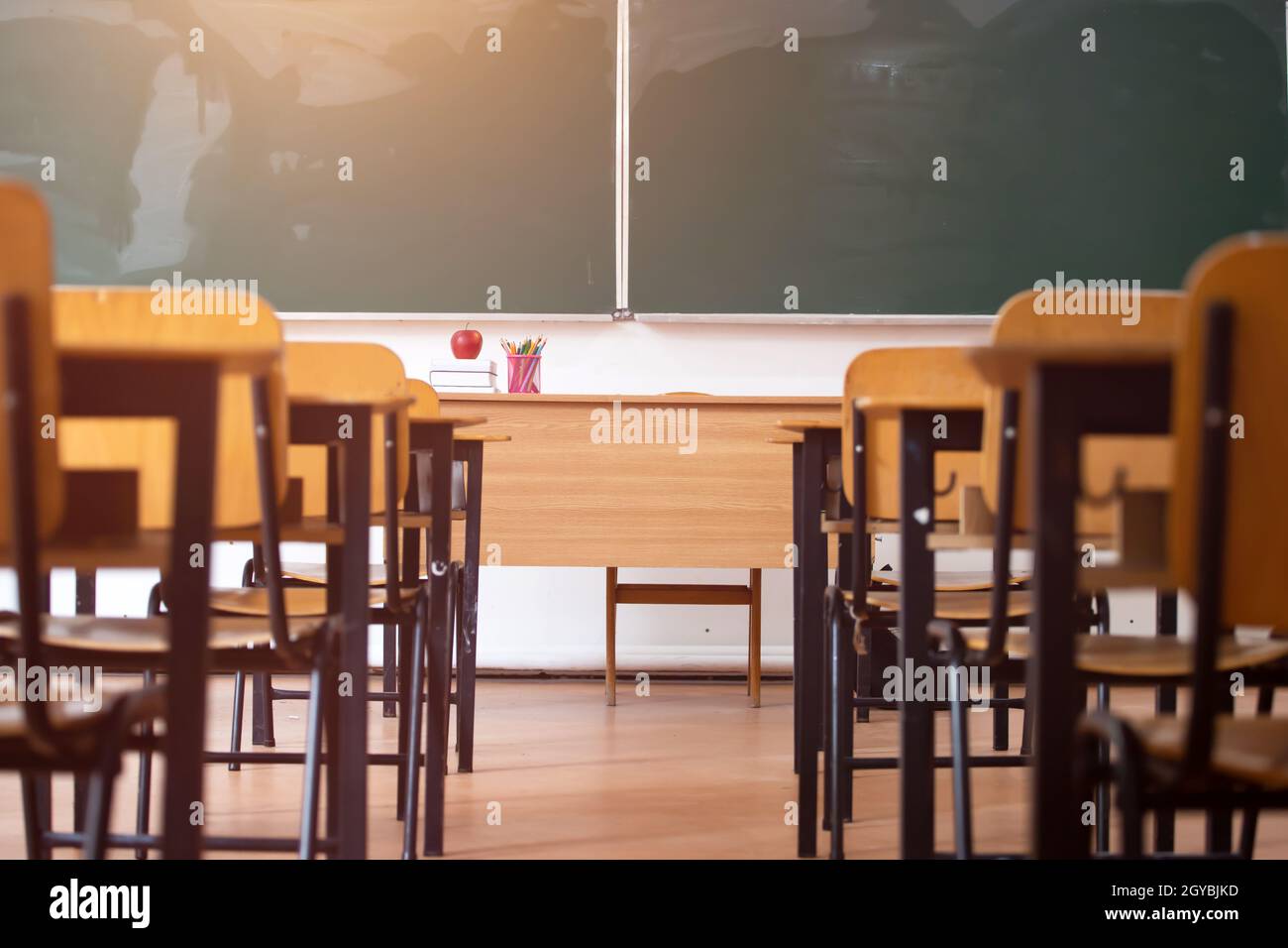 Back to School Concept. Empty classroom with chairs, desks and ...