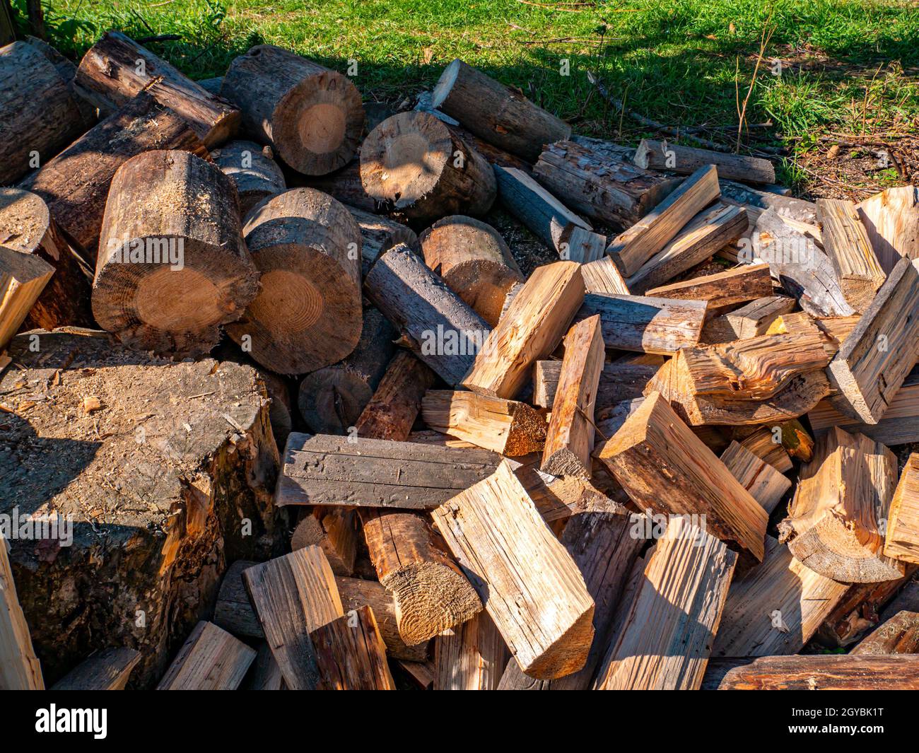 Wood chopped with an ax for heating a rural house. Wood burning stove ...