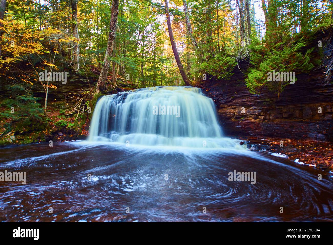 Gorgeous waterfall at Rock River Falls and its enormous basin under ...