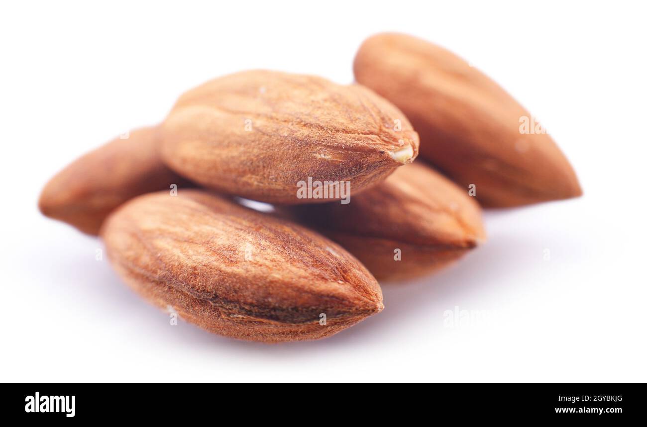 Composition with shellless almonds isolated on white Stock Photo - Alamy