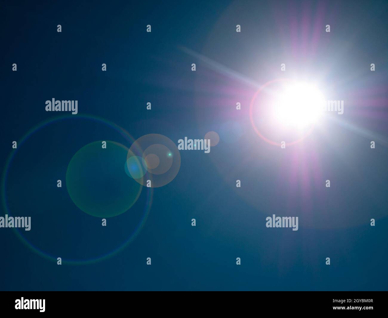 The sun on the background of a blue cloudless sky. Cloudy landscape ...