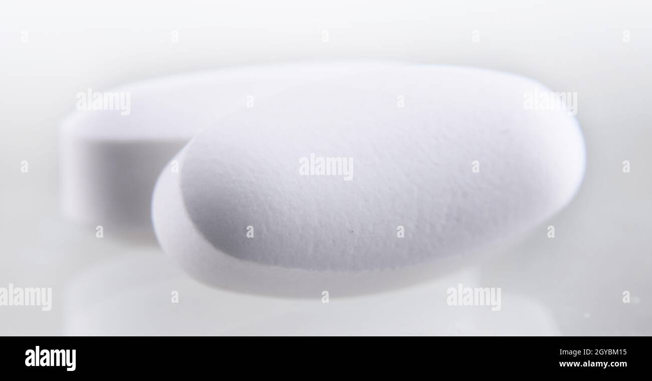 Composition with pharmaceutical drug pills over white background Stock ...