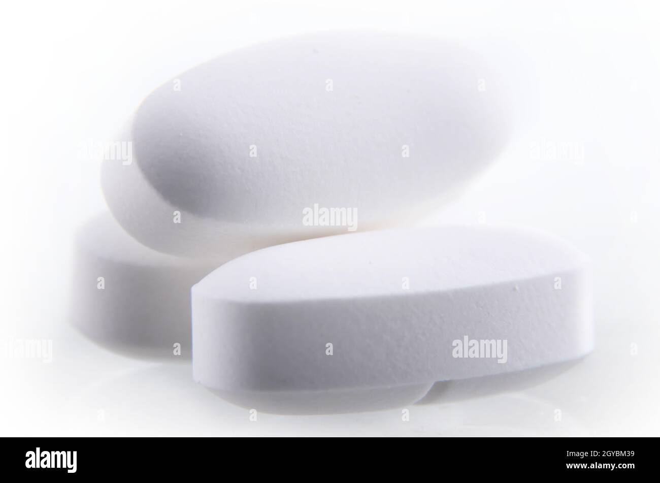 Composition with pharmaceutical drug pills over white background Stock ...