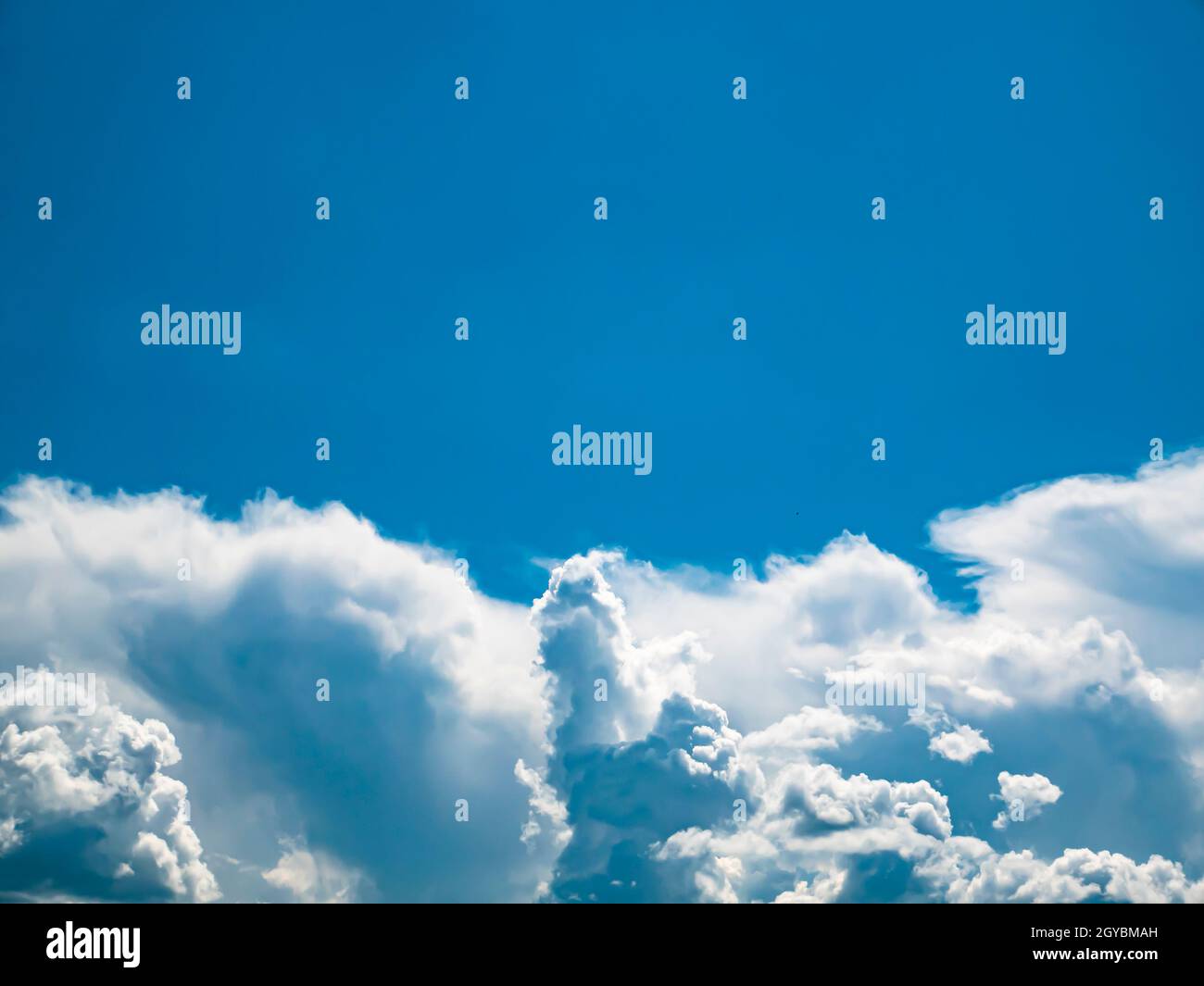 Flying over white clouds against a blue sky. Space. Stratosphere ...