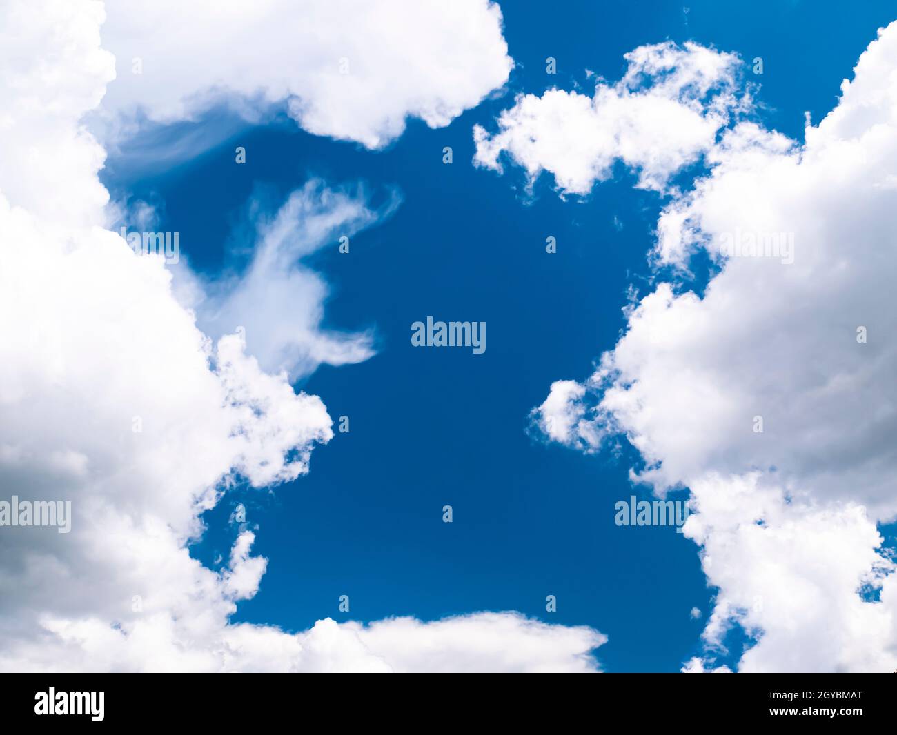White clouds on a background of blue sky. Cloudy landscape. Cumulus ...