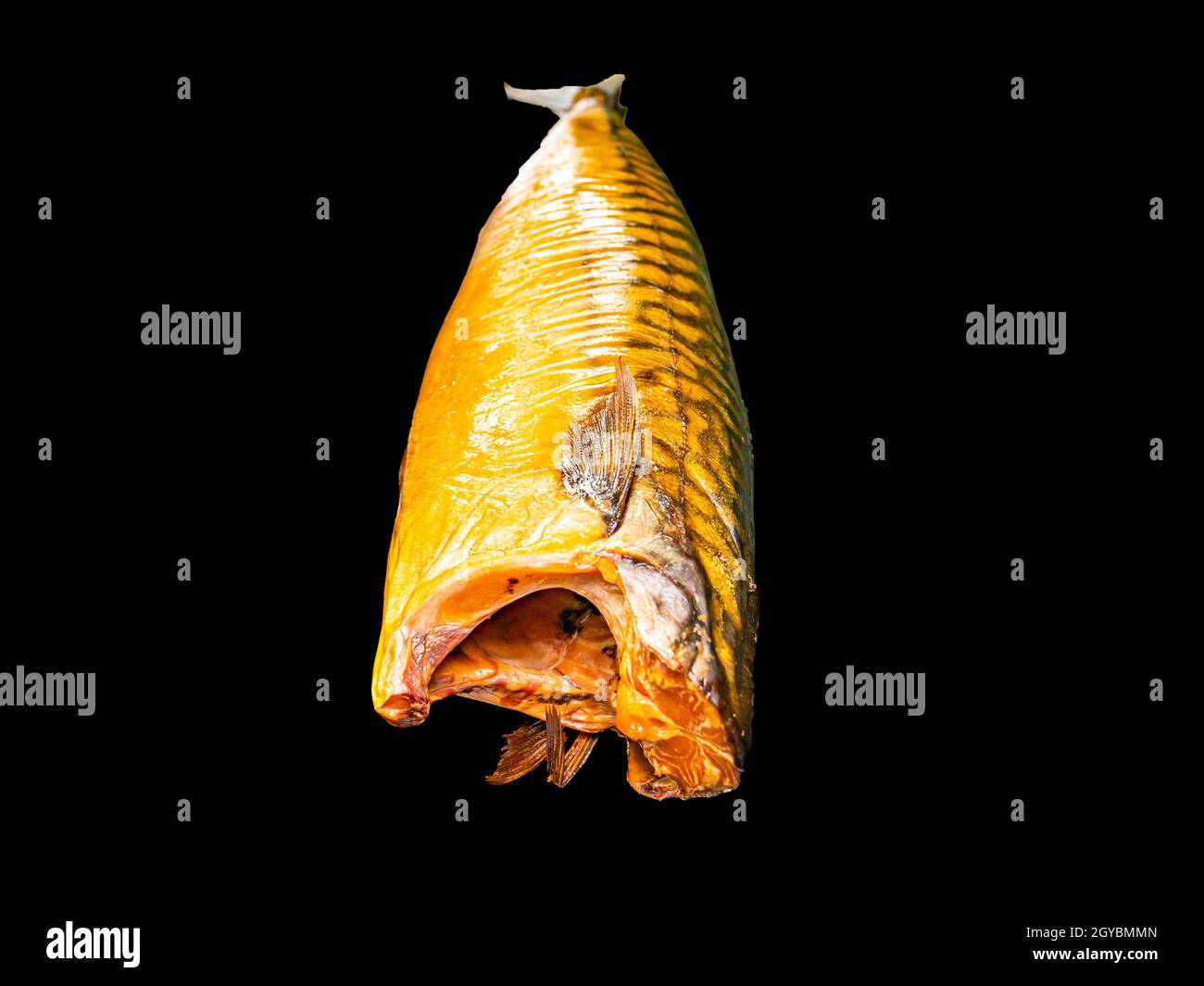 Smoked mackerel fish on a black background. Salted mackerel fish ...