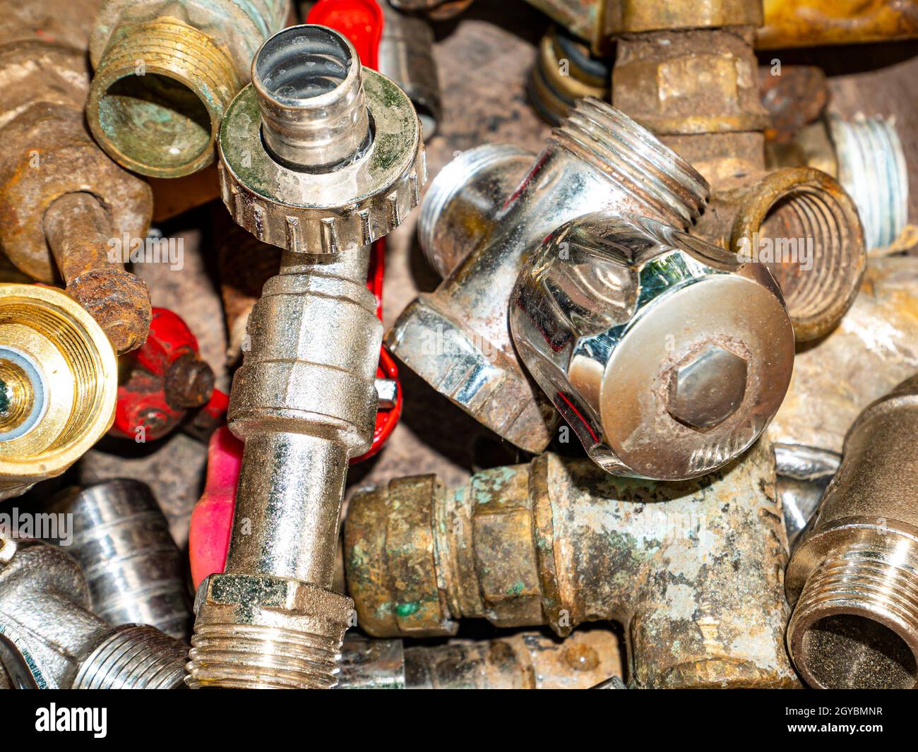 Old taps with a valve for opening water tap. Valve for opening and ...