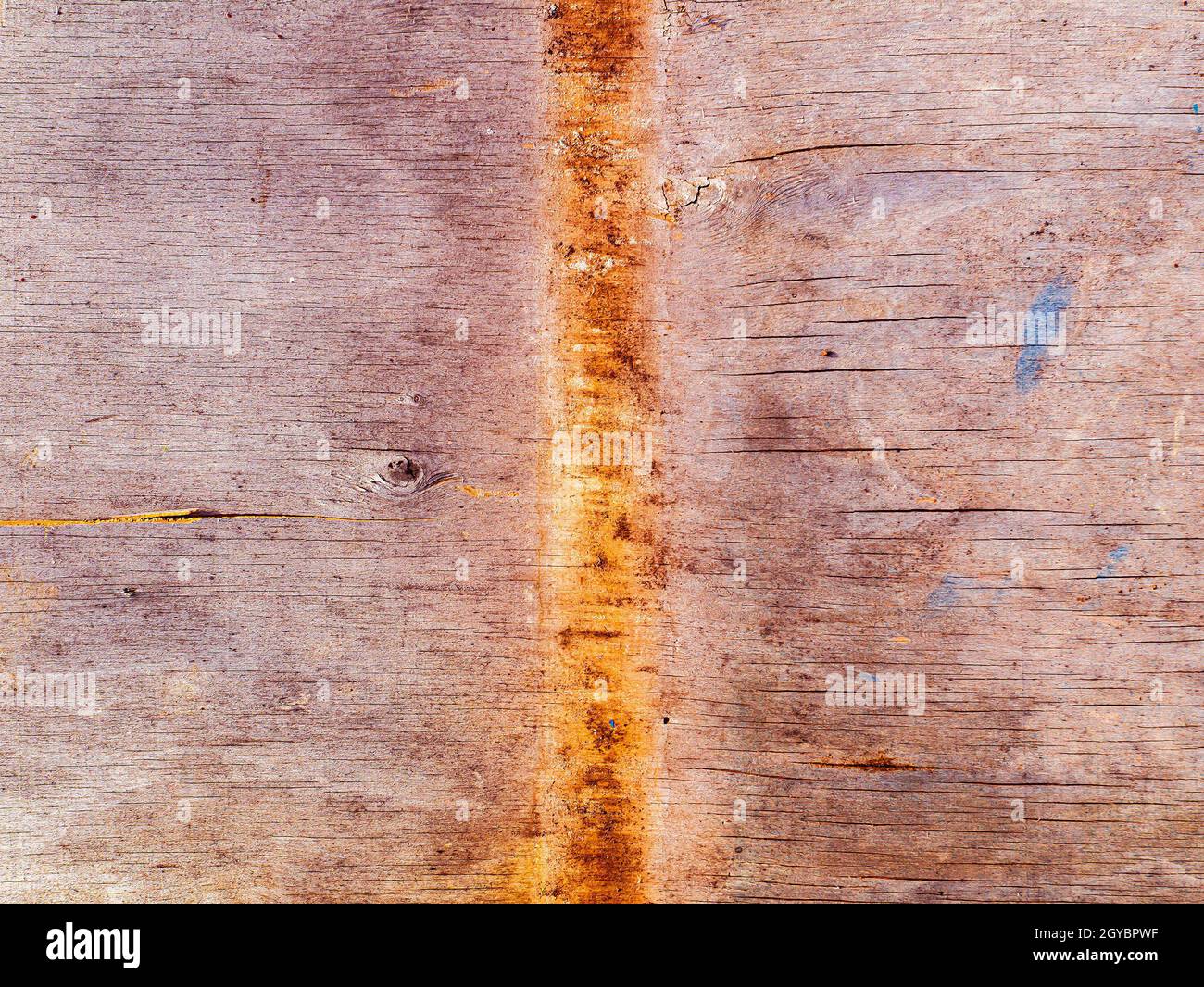 Faded texture of a wooden plank surface with rusty spots. Rusty metal ...