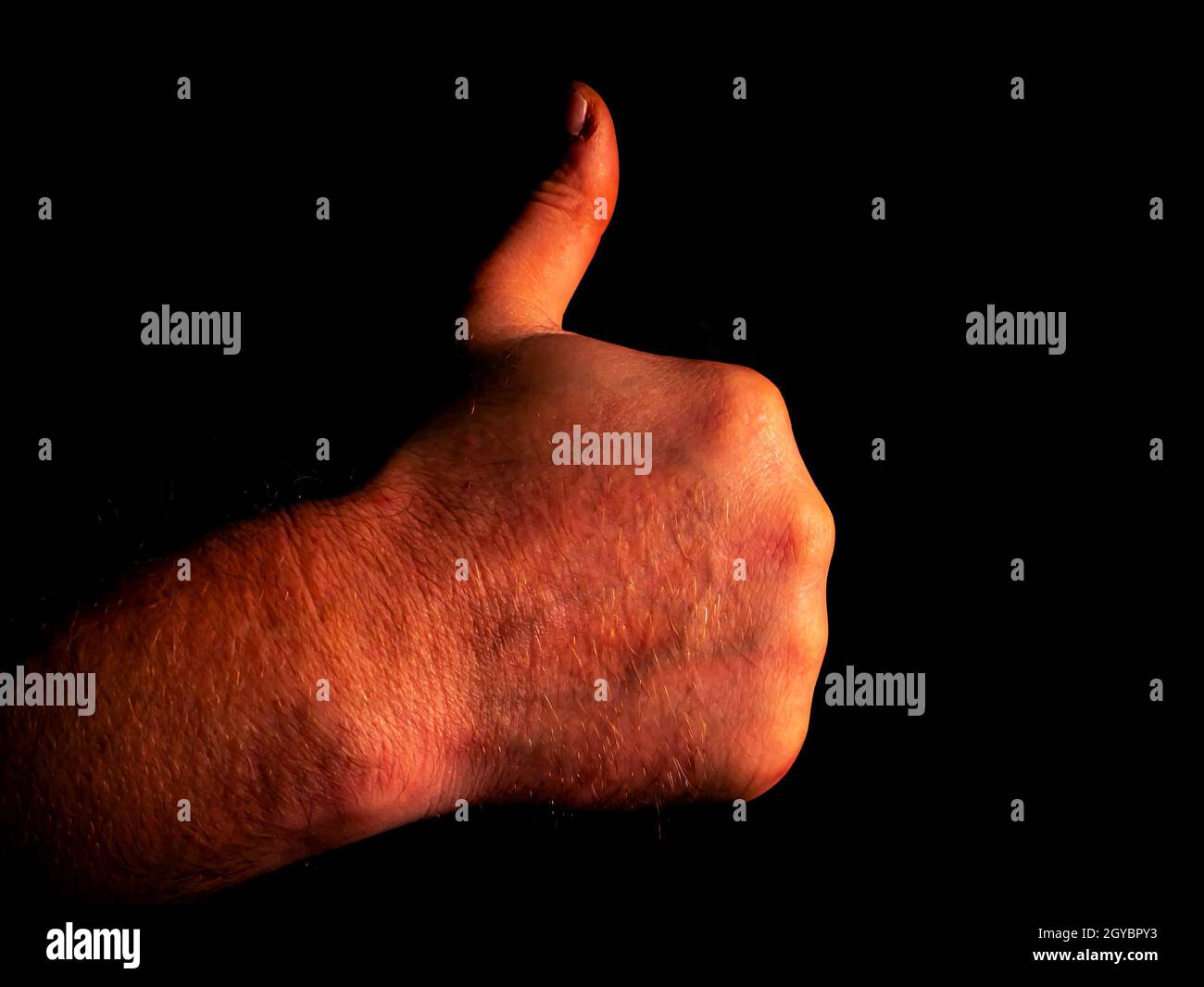 Hand gesture everything is ok on a black background. The gesture is ok ...