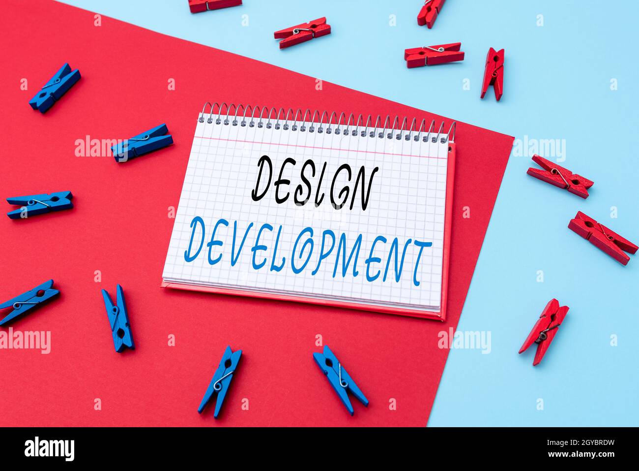 Sign displaying Design Development, Business overview technical aspects ...