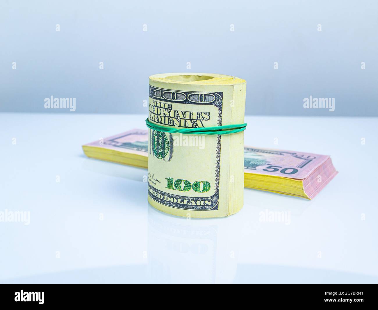 Money tied hi-res stock photography and images - Alamy